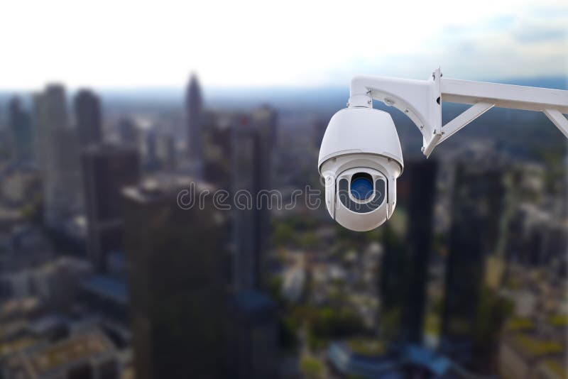 CCTV Camera Operating with City in Background. Stock Image - Image of ...