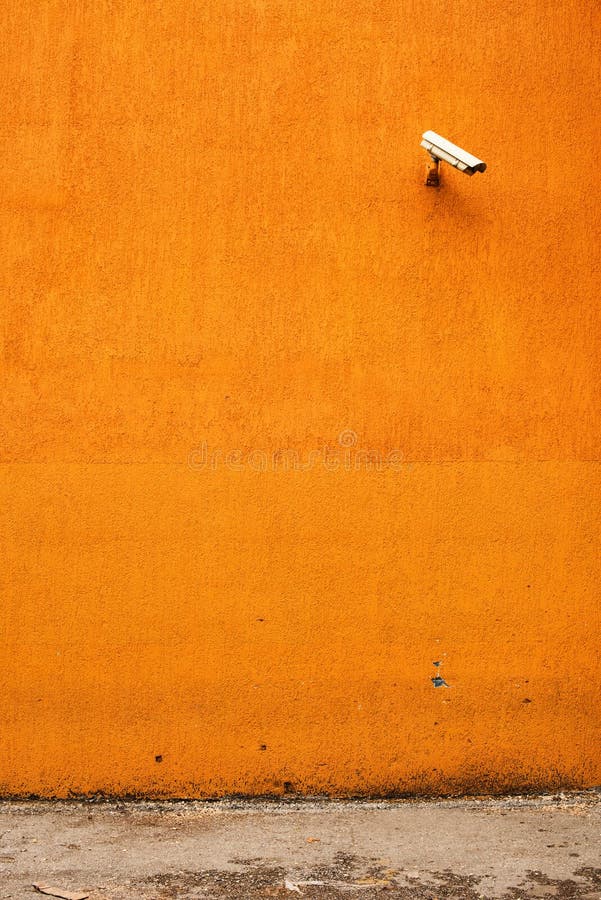 CCTV Camera on Orange Building Facade Stock Photo - Image of cctv ...