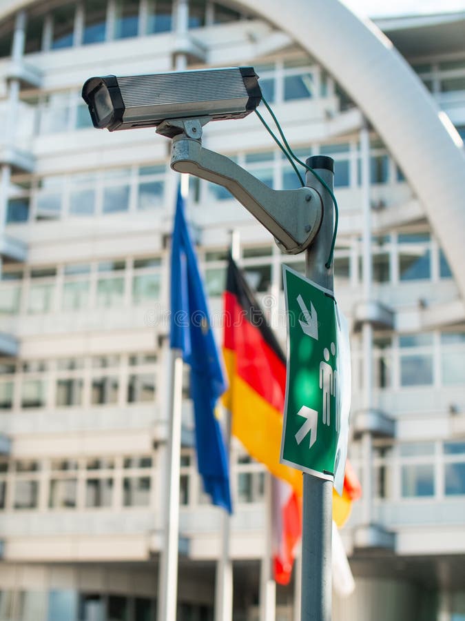 CCTV Camera on a Pole with Flags Stock Image - Image of background ...