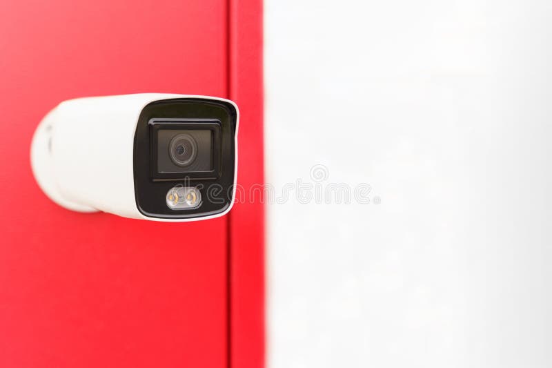 CCTV Camera on a Red Background, Next To a White Background for Text ...
