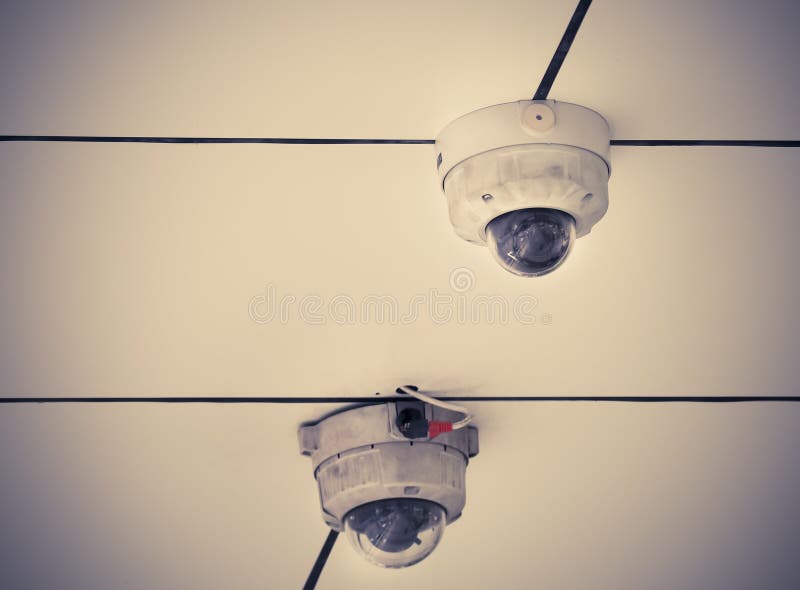 CCTV Camera Mounted On The Ceiling And Wall. Stock Photo - Image of ...