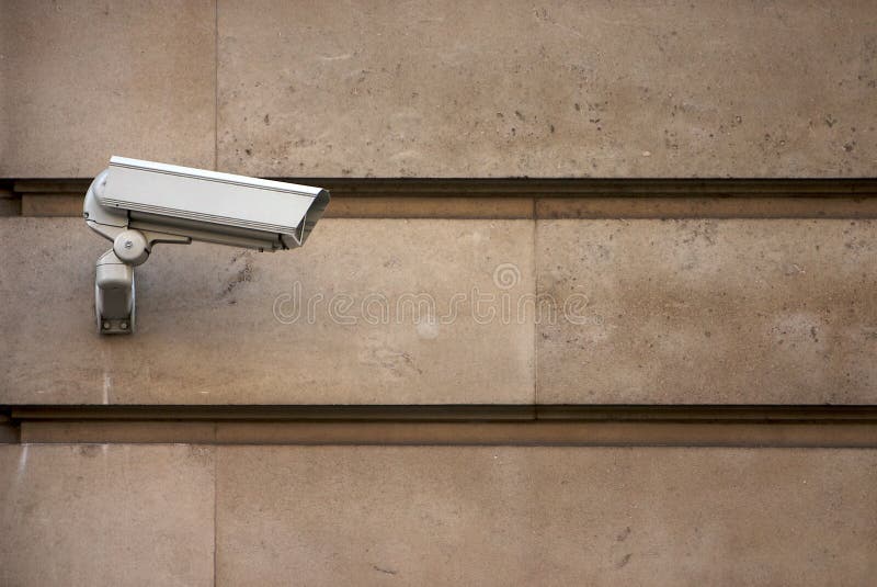 CCTV Camera on Stone-clad Wall Stock Photo - Image of building ...