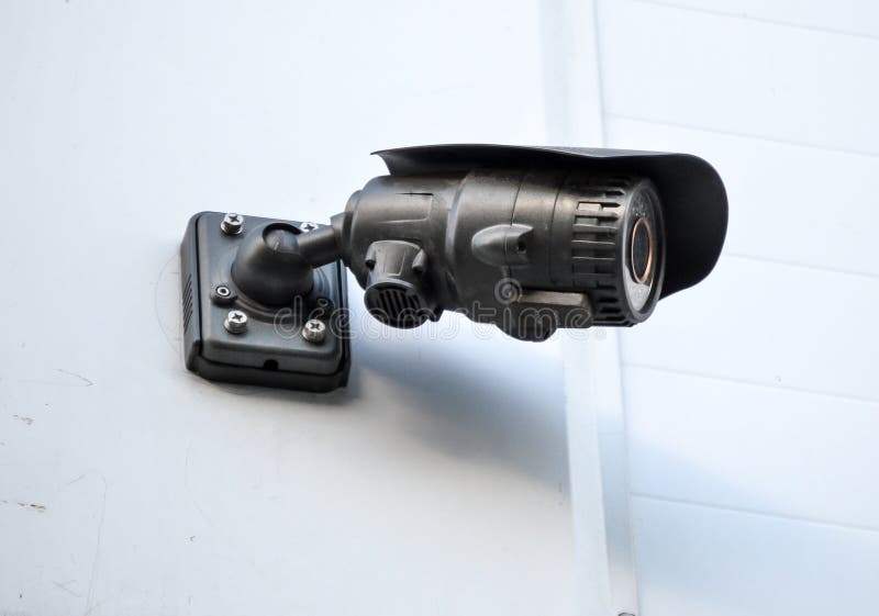 CCTV Camera on the Street on the Building Wall Stock Photo - Image of ...