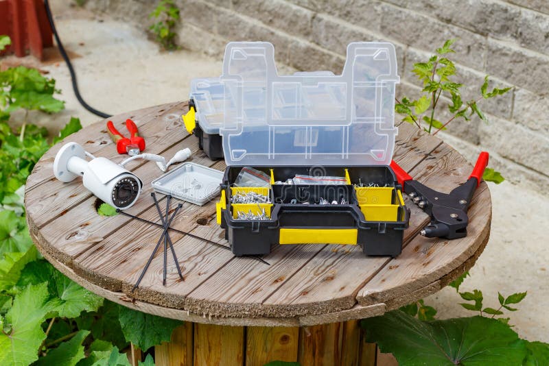 CCTV Camera with Supplies and Tools for Mounting on a Wooden Surface ...