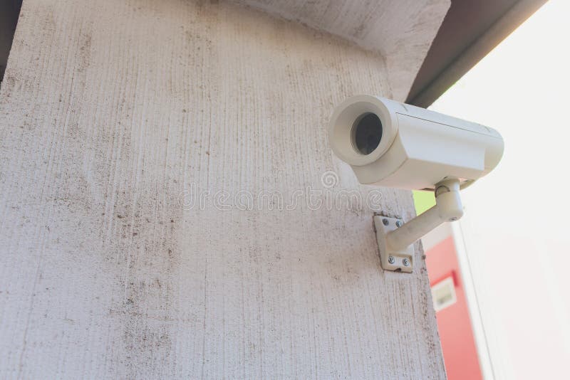 CCTV Camera or Surveillance Installed on Wall. Stock Photo - Image of ...