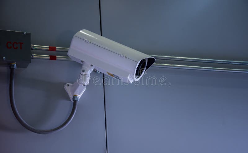 CCTV camera on the wall stock photo. Image of equipment - 115095652