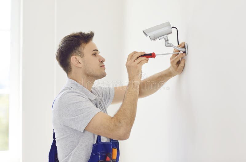 Cctv Camera Wall Installation by Professional Male Technician at Wall ...