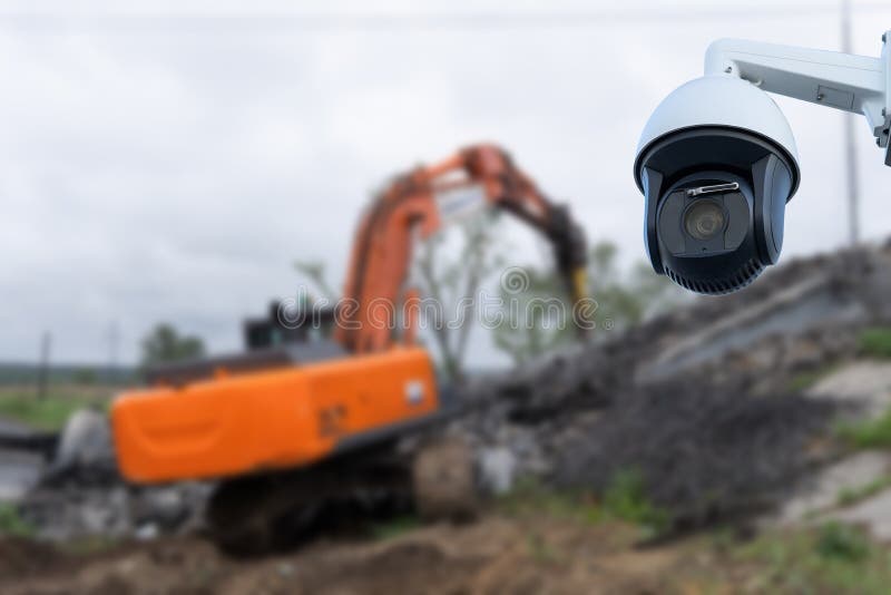 CCTV Camera Watching an Excavator and Workers Working on a Construction ...