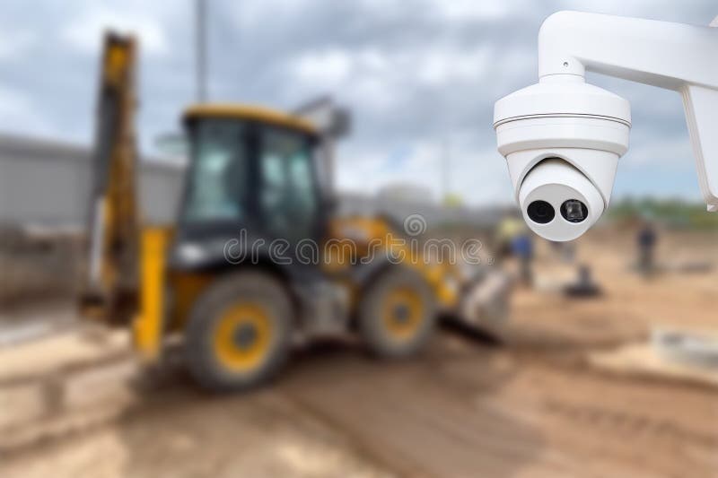 CCTV Camera Watching an Excavator and Workers Working on a Construction ...