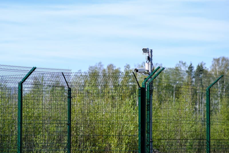 CCTV cameras on the fence stock image. Image of fence - 183962157