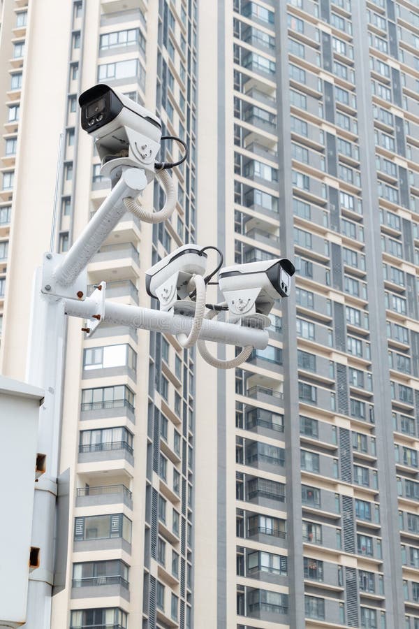 CCTV Cameras in Front of Residential Buildings Vertical Composition ...