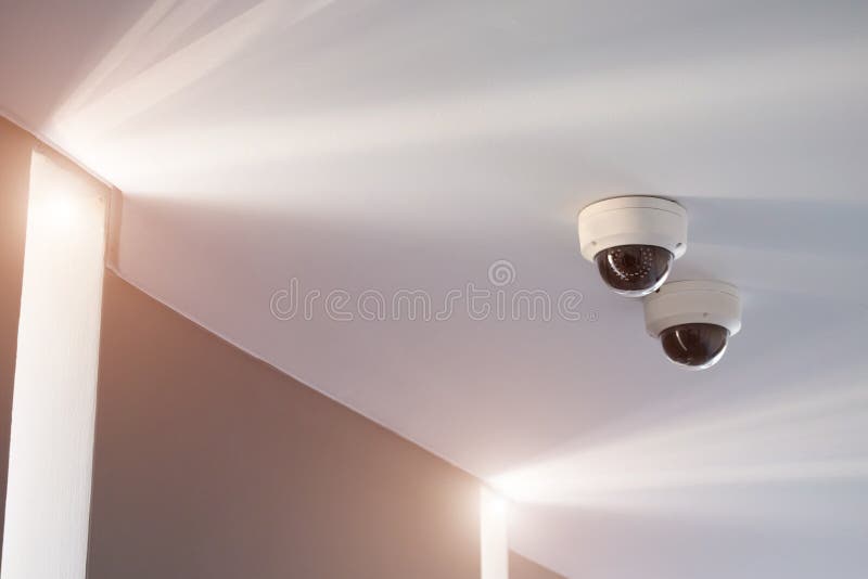 CCTV Security Camera Mounted on a White Ceiling. Stock Photo - Image of ...