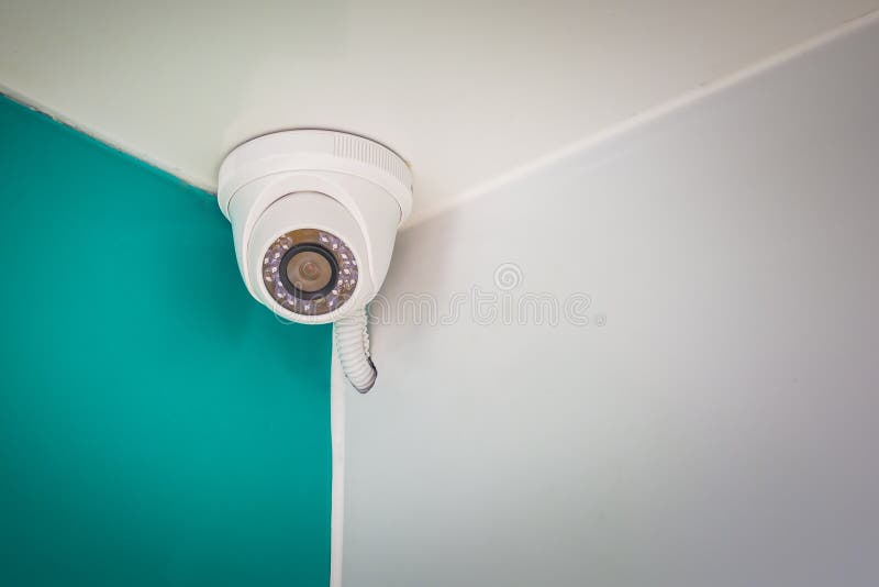 CCTV in a corner stock photo. Image of green, ceiling - 58754462
