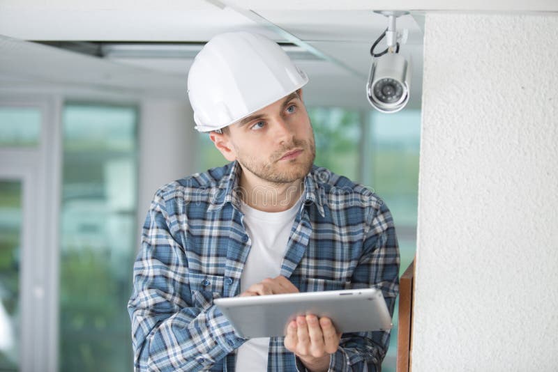 Cctv Installer Working in Building Stock Image - Image of person ...