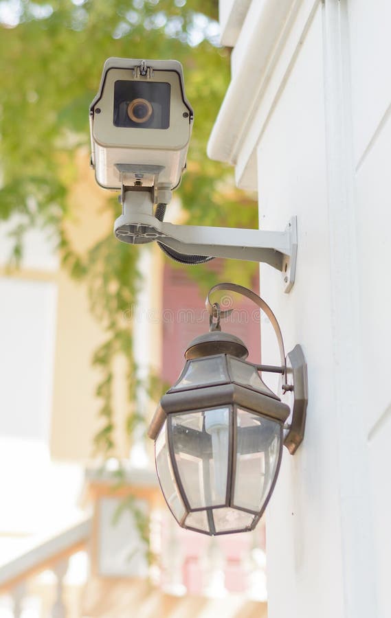CCTV with lamp stock image. Image of business, white - 48024429