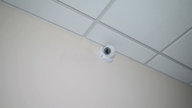 CCTV is Located on the Wall Under the Ceiling, White Round Surve Stock ...