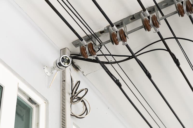 CCTV Mounted on the Front Wall of House. and Main Cable for Power ...