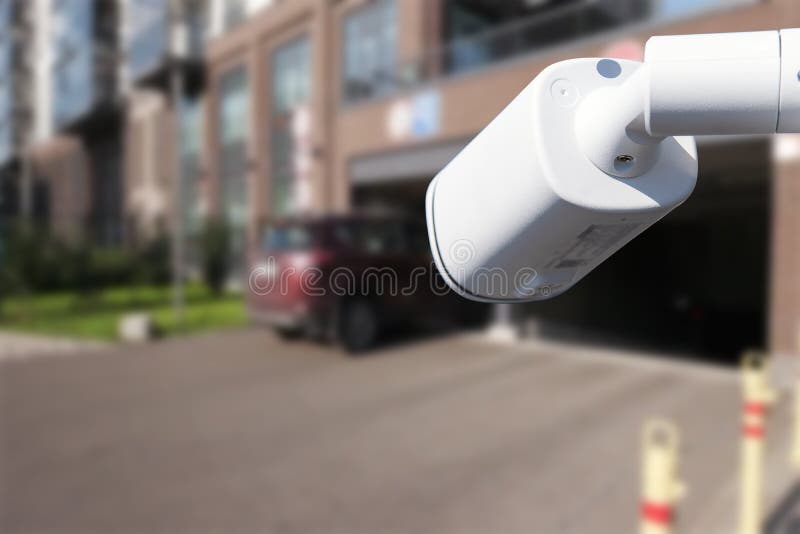 CCTV Security Camera on Blur Car Parking. Stock Photo - Image of cctv ...