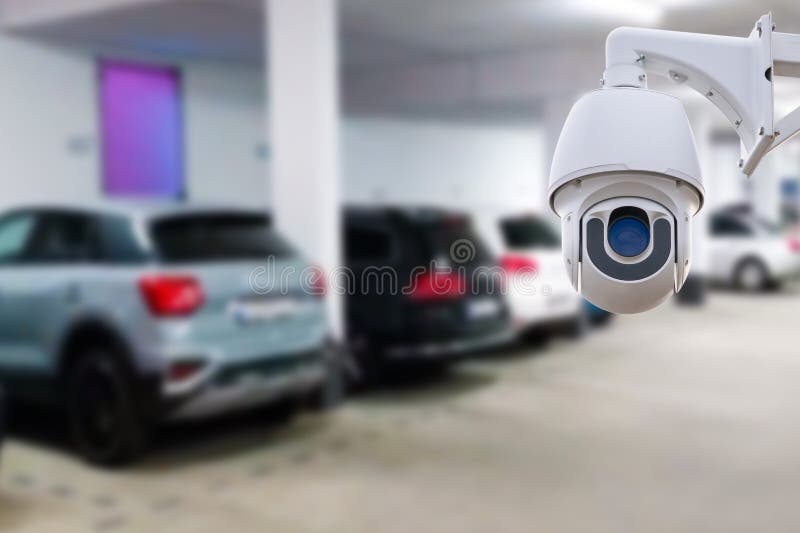 CCTV Security Camera on Blur Car Parking. Copy Space. Stock Photo ...