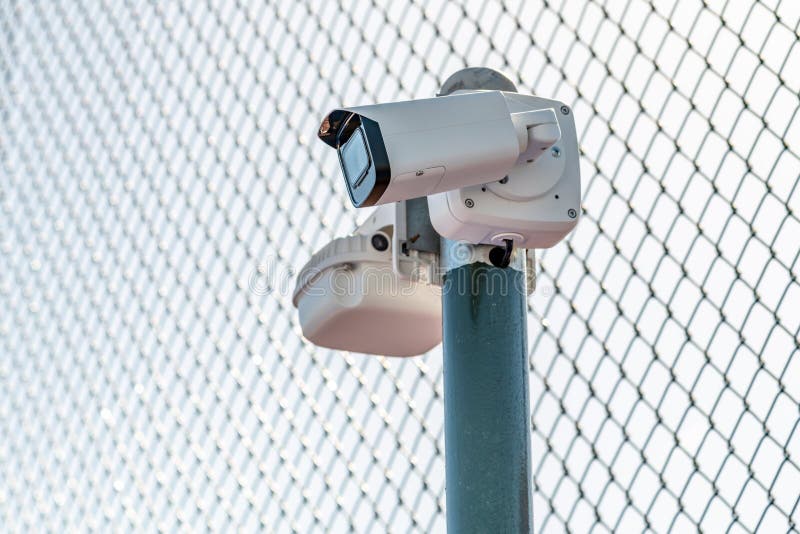 CCTV Security Camera in Front of the Restricted Area Surrounded by Wire ...