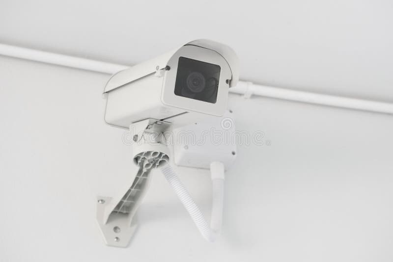 CCTV Security Camera Installed on the Building Wall, Operating I Stock ...