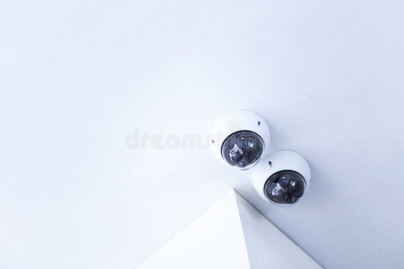 CCTV Security Camera Installed on the White Ceiling Stock Photo - Image ...