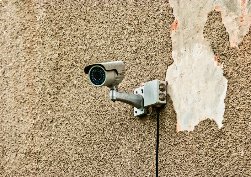 CCTV Security Camera Mounted on the Damaged Wall Outside Stock Image ...