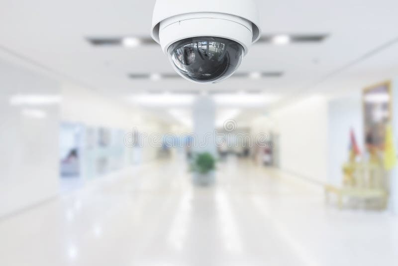 CCTV Security Camera Operating in Hospital on Blur Background Stock ... CCTV Security Camera Operating in Hospital on Blur Background Stock ...