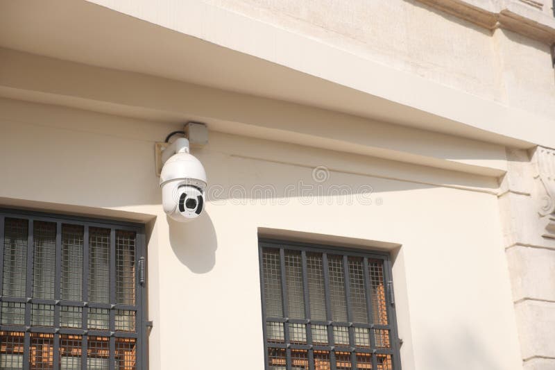 CCTV Security Camera Operating on a House Building Stock Photo - Image ...