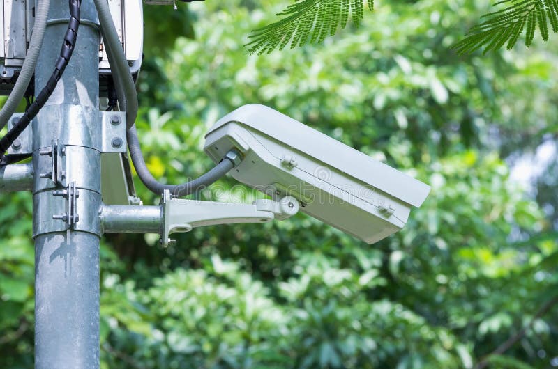 Security Camera Monitoring the Oil and Gas Refinery at Twilight Stock ...