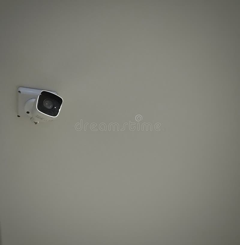 CCTV Security Camera on Top, Operating Inside the Building. the ...