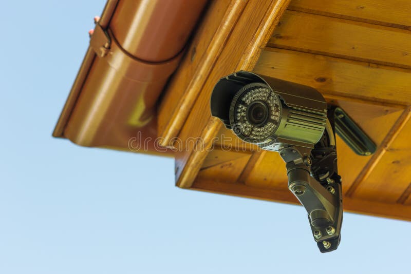 CCTV Security Camera Under the Roof Stock Photo - Image of camera ...
