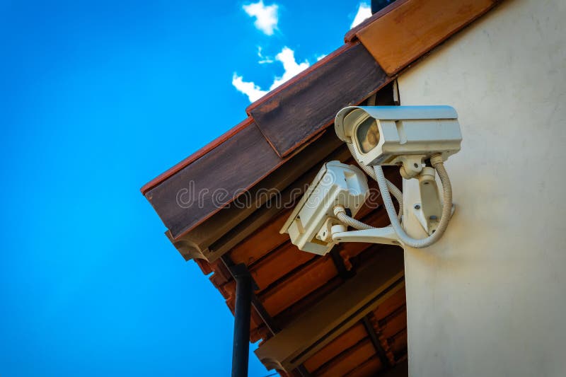 CCTV or Security Cameras Installed at the Building with Modern ...