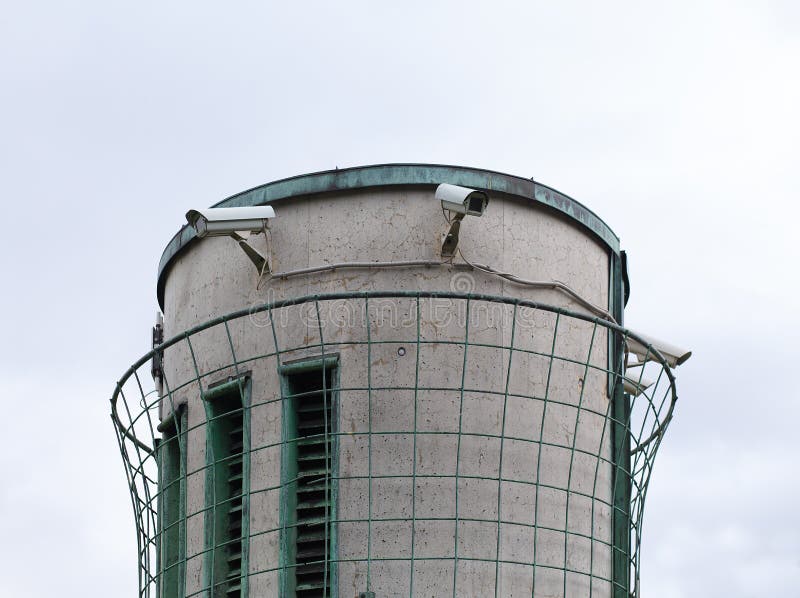 The CCTV Security Cameras Operating on Building Tower Stock Image ...
