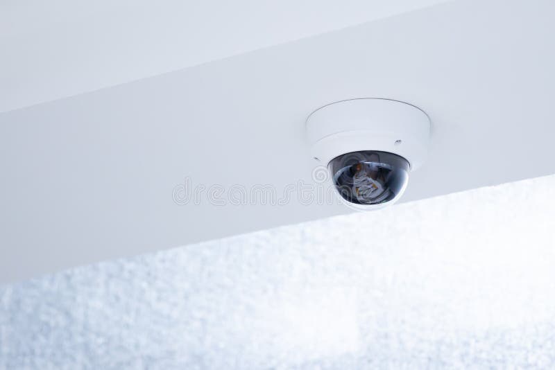 Close-up IP Surveillance Camera on the Ceiling for Office Security ...