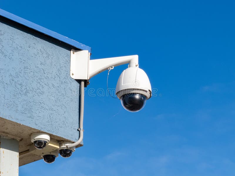 CCTV Surveillance Camera in the Area, Security of the Streets, Face ...