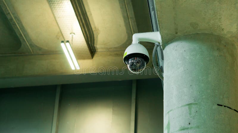 CCTV Surveillance Security Camera on Concrete Pole of Building for ...