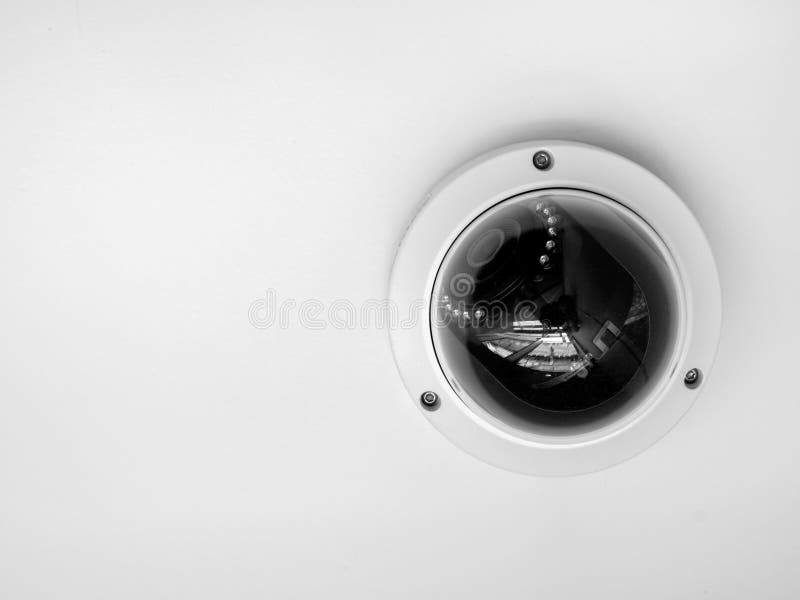 CCTV System Security. Close-up Round CCTV Camera on Ceiling Isolated on ...
