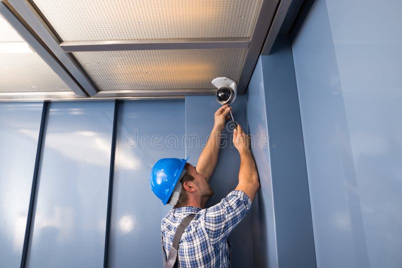 Cctv Technician Fixing Camera Stock Image - Image of ceiling, cctv ...