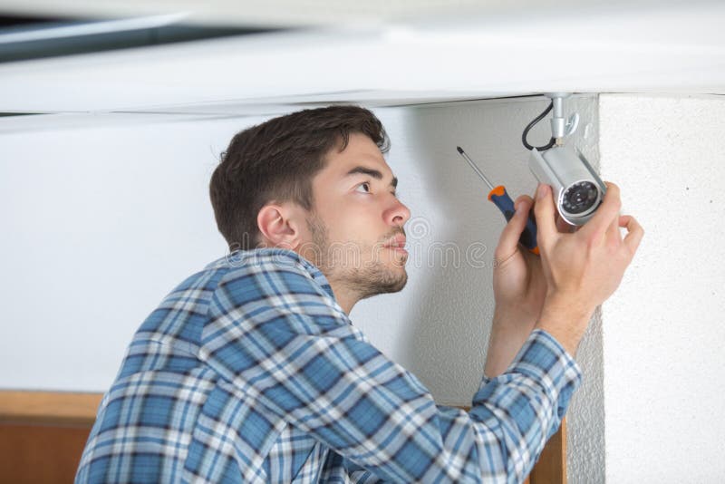 Cctv Technician Installing Device Stock Photo - Image of maintenance ...
