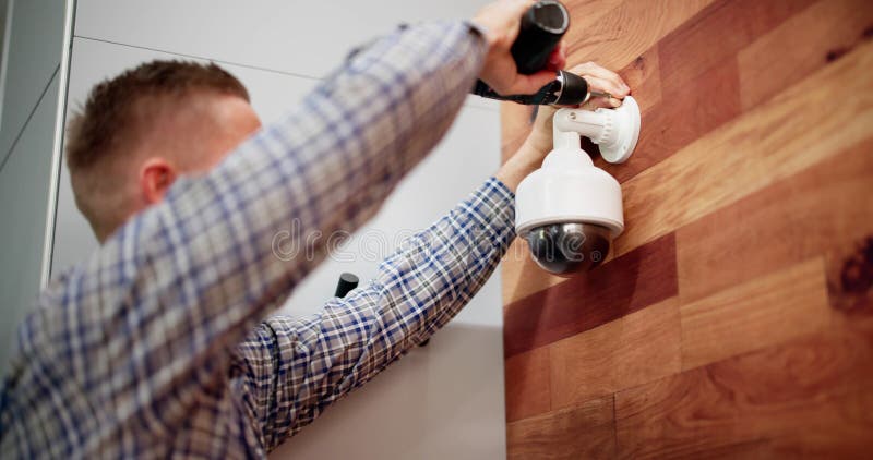 CCTV Technician on Stepladder Fixing Security Stock Image - Image of ...
