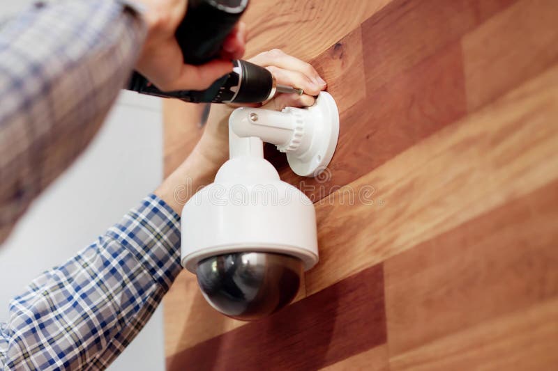 CCTV Technician on Stepladder Fixing Security Stock Image - Image of ...