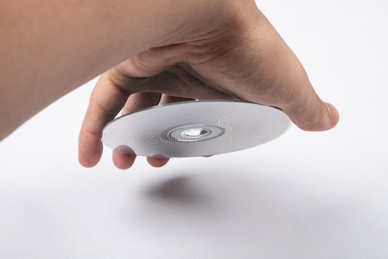 Cd Compact Disc in Hand on White Background Stock Image - Image of ...