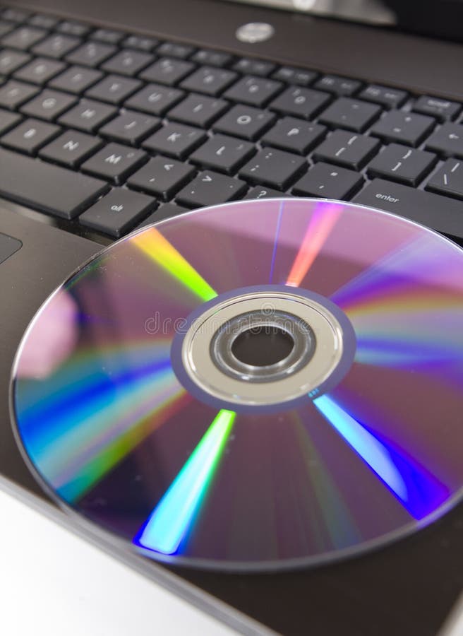 Cd on computer stock image. Image of closeup, blue, business - 22944511