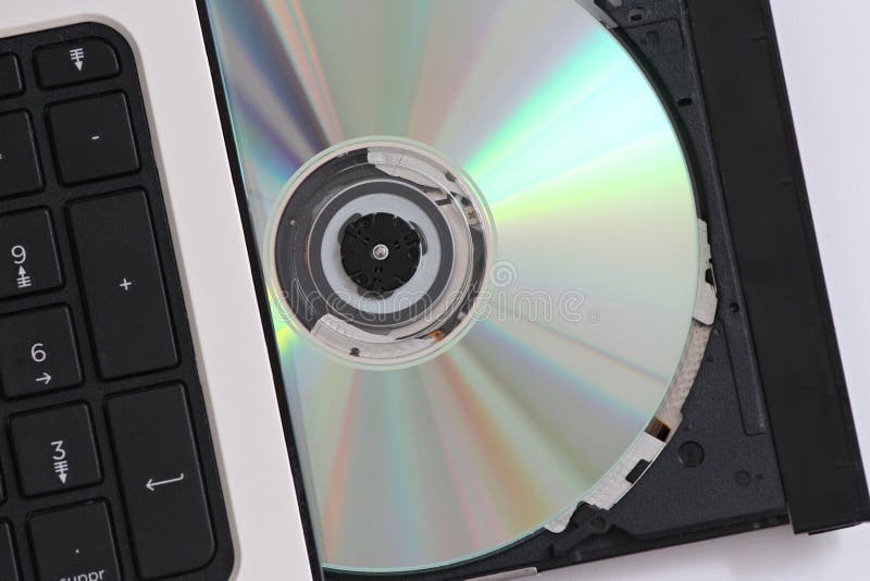 CD into a computer stock image. Image of read, entertainment - 65632587