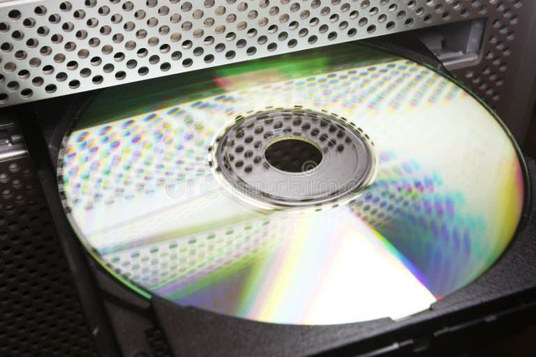 CD in computer disc drive stock photo. Image of digital - 23936234