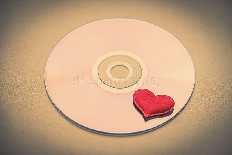 CD Disk with a Heart stock image. Image of multimedia - 250497807