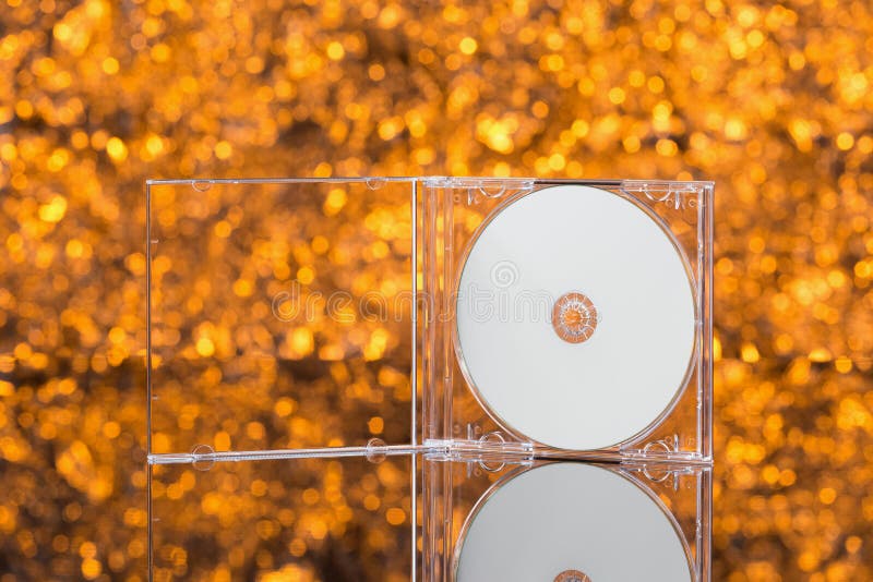 CD / DVD Box on Orange Background Stock Photo - Image of circle ...