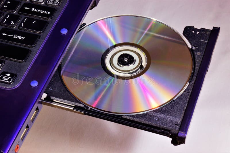 CD in computer disc drive stock photo. Image of digital - 23936234 CD in computer disc drive stock photo. Image of digital - 23936234
