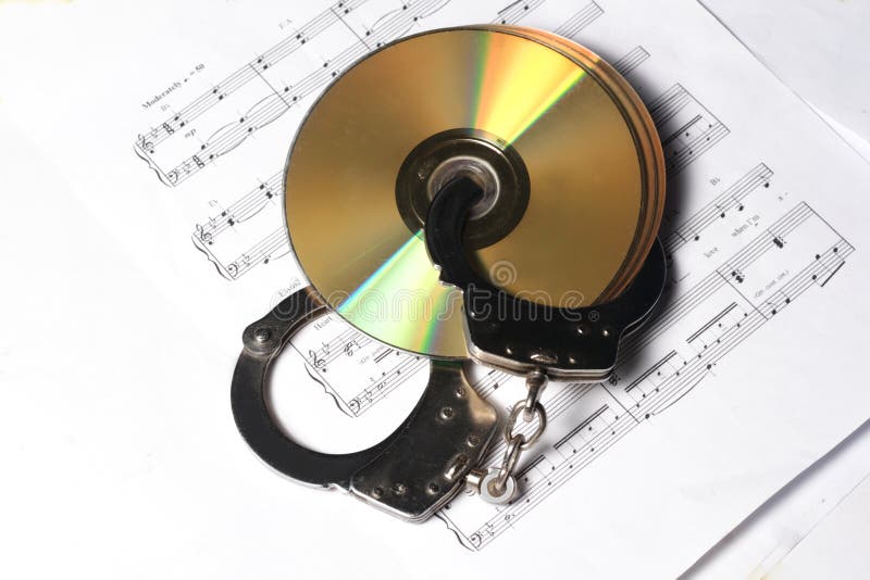 CD or DVD with Musical Note with Handcuff Stock Photo - Image of bluray ...